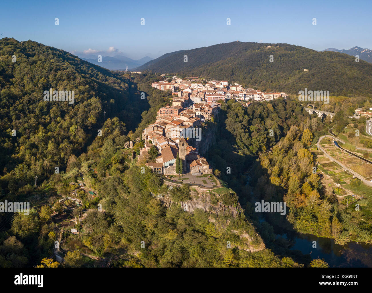 Aerial view of Castellfollit de la Roca cliff village in Catalonia ...