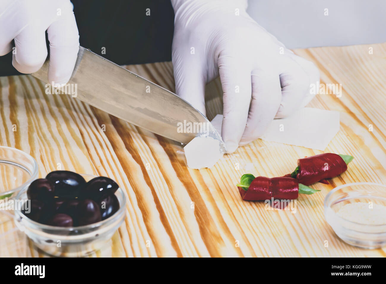 Cook preparing canapes in the kitchen at the restaurant Stock Photo - Alamy