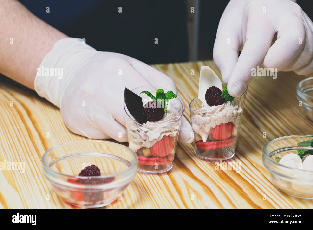 Cook preparing canapes in the kitchen at the restaurant Stock Photo - Alamy