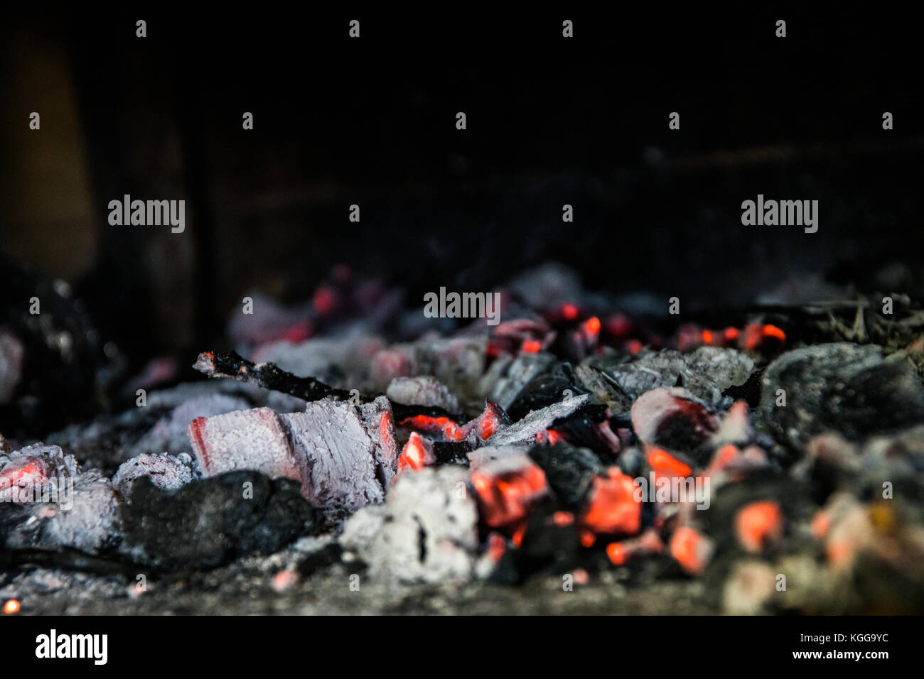 Hot coal, embers of the grill and smoke close up Stock Photo - Alamy