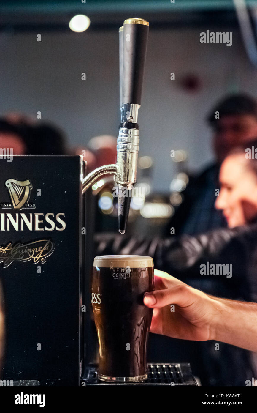 Pint of guinness placed on top of draft counter at Guinness Storehouse ...