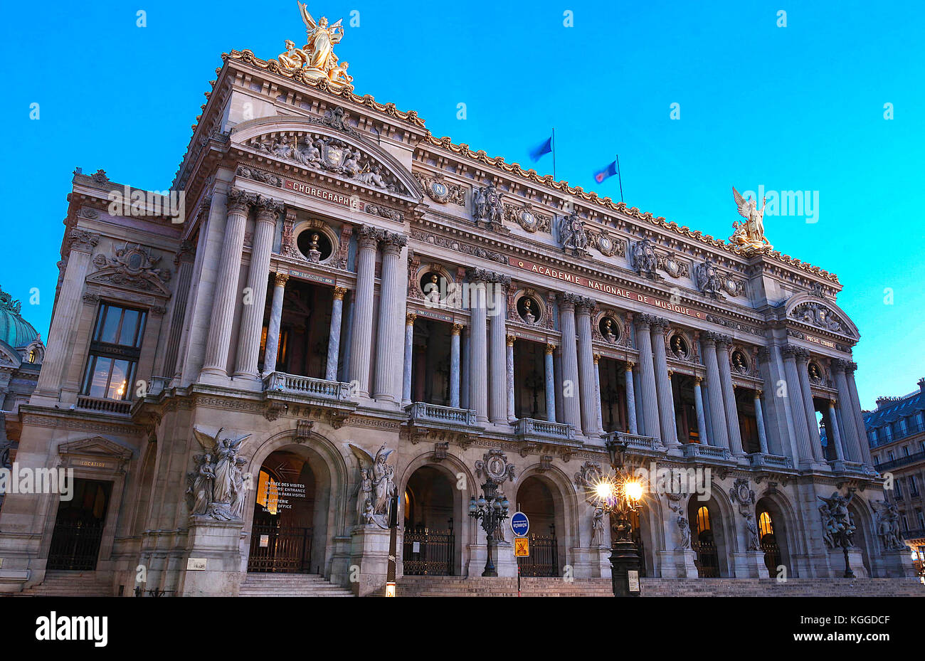 Night front view of the Opera National de Paris. Grand Opera is famous ...