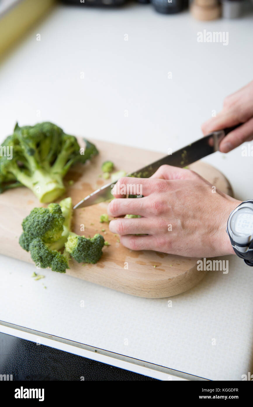 preparing broccoli in kitchen Stock Photo - Alamy