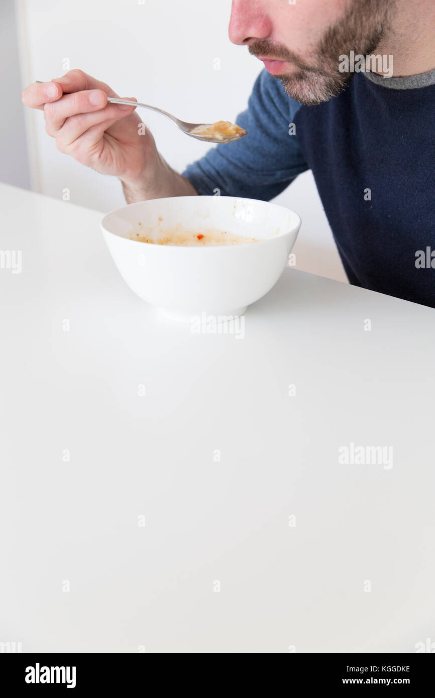 Male eating alone hi-res stock photography and images - Alamy