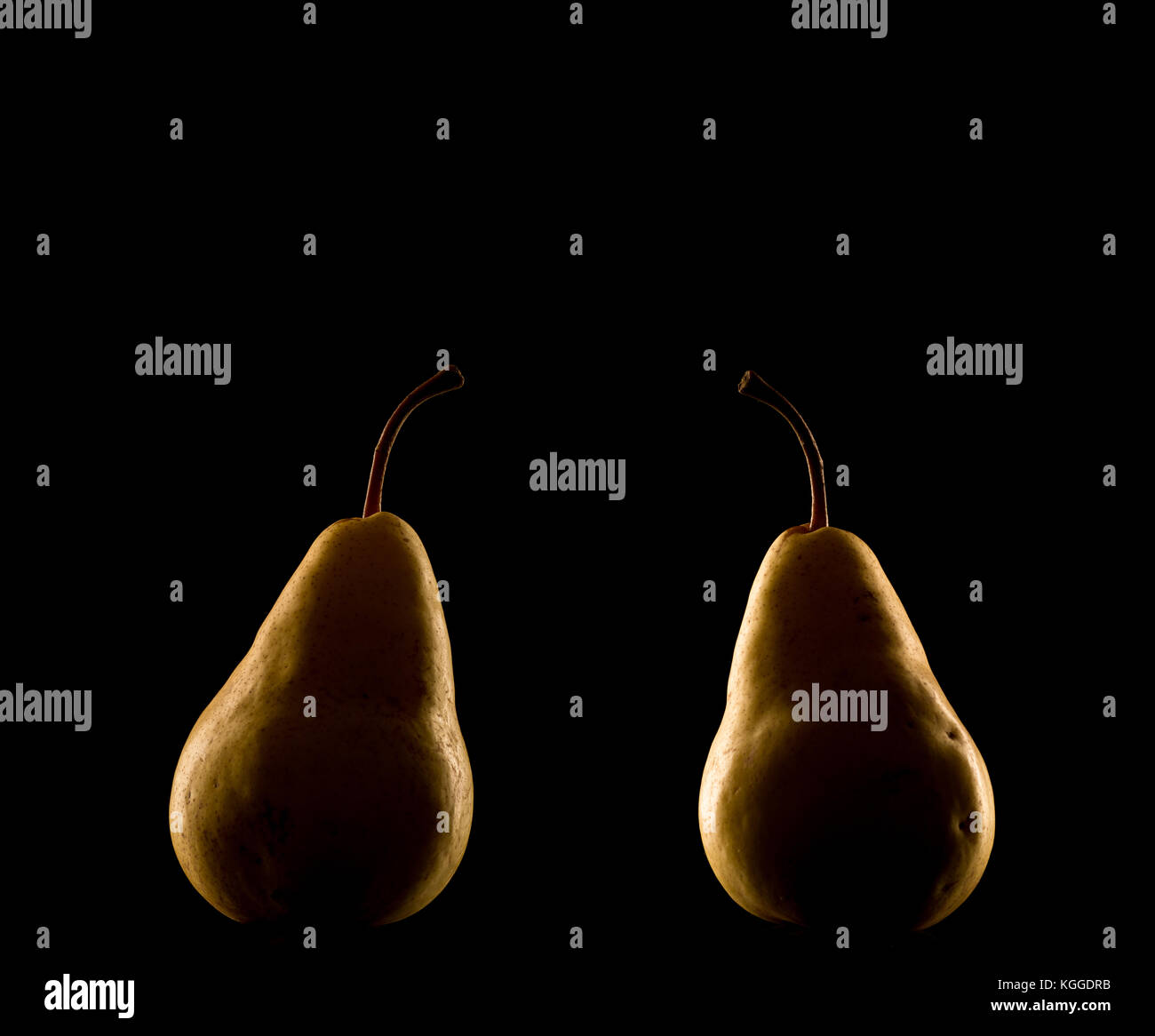 Elegant pear isolated on black background with backlighting Stock Photo ...
