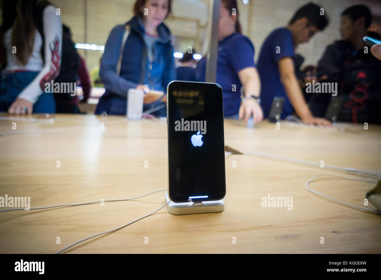 Customers in the Apple store in Grand Central Terminal in New York try ...