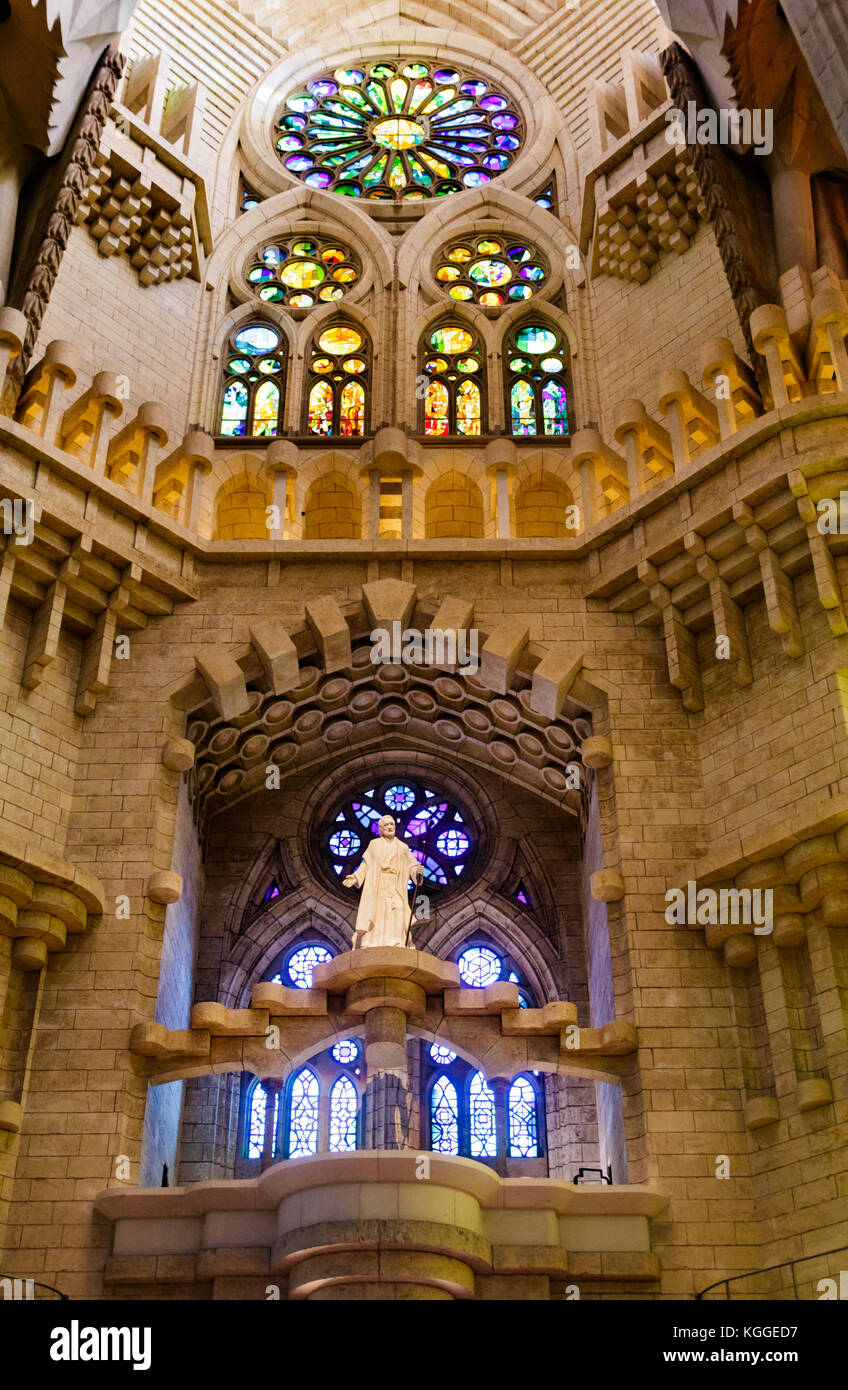 Statue of Jesus by Stained Glass in Church Stock Photo - Alamy