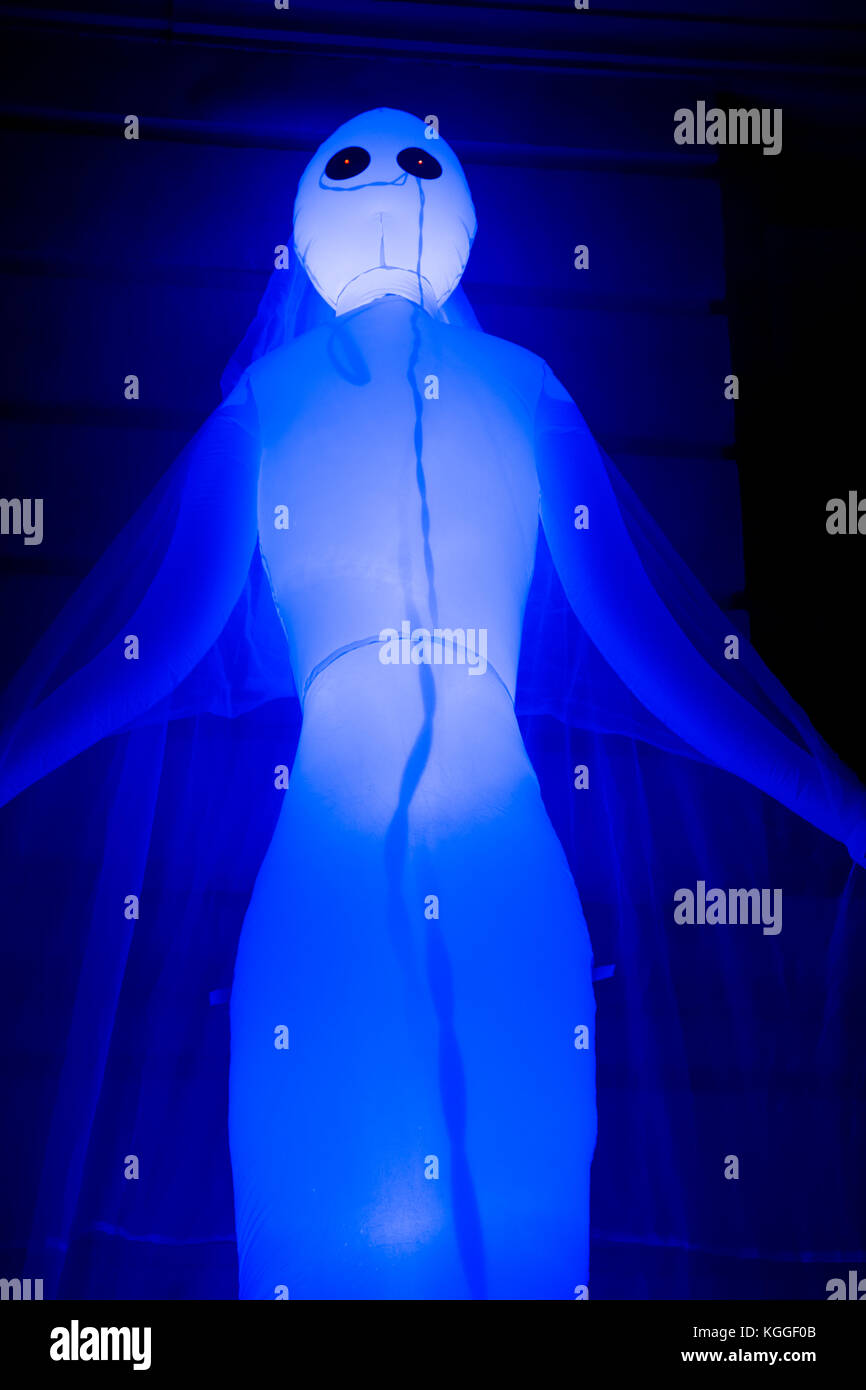 Blue glowing ghost dark background night Stock Photo - Alamy