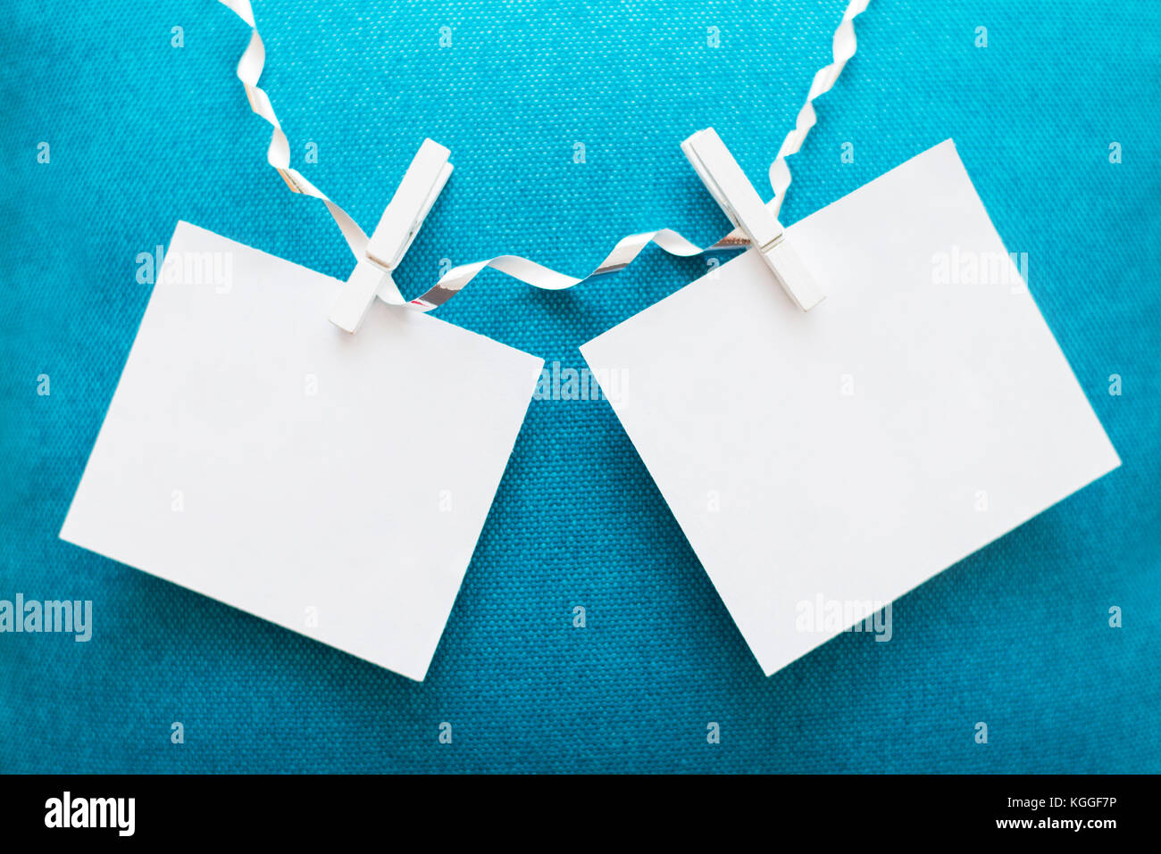 Mock up, hanging on a string with clothespins Stock Photo - Alamy