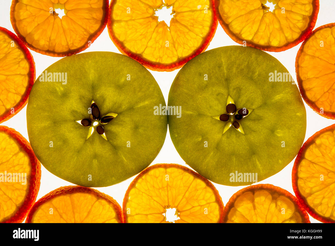 Organic citrus fruit and apple cross-section Stock Photo - Alamy