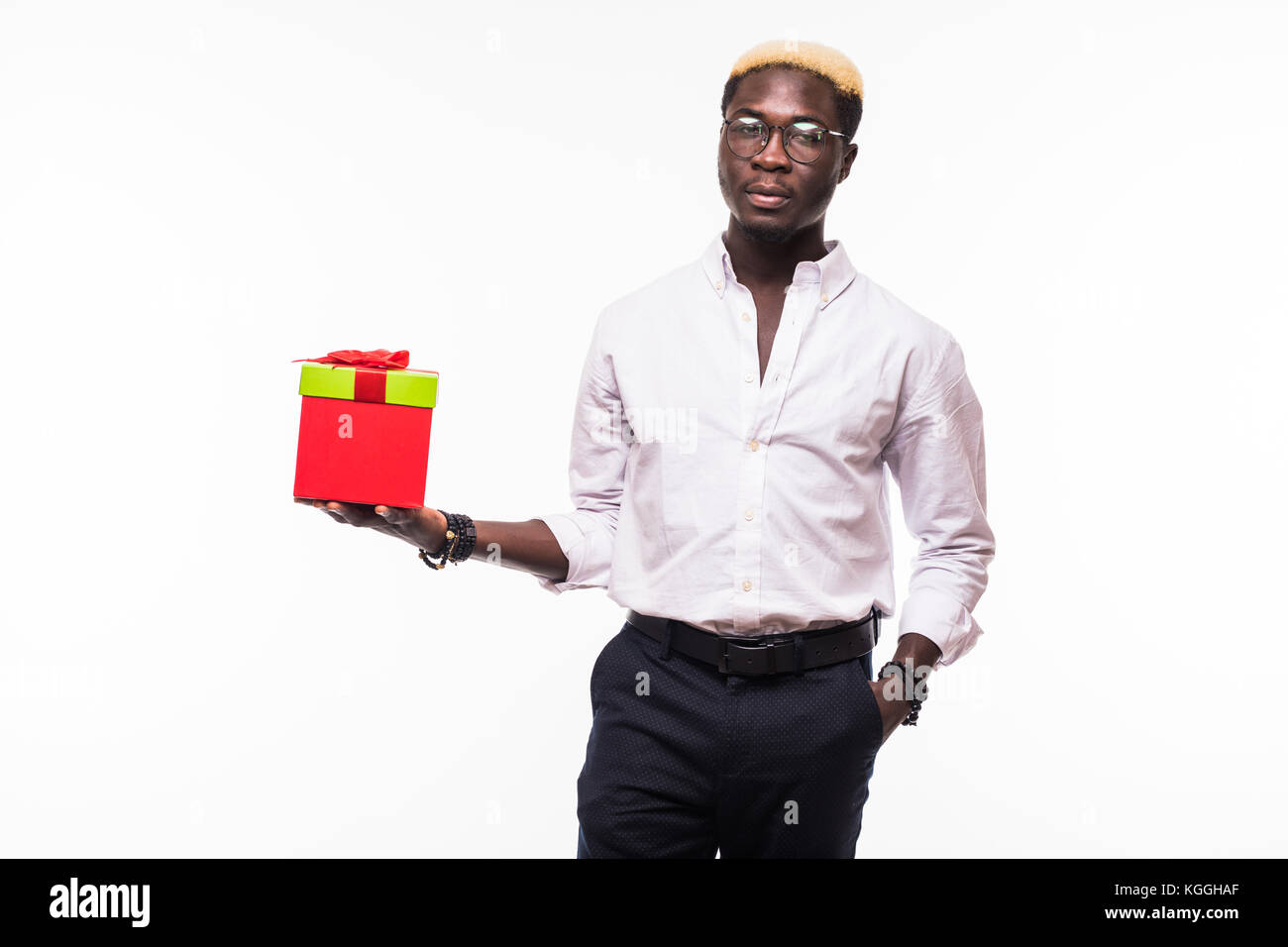 Handsome cool black man with a gift on white background Stock Photo - Alamy