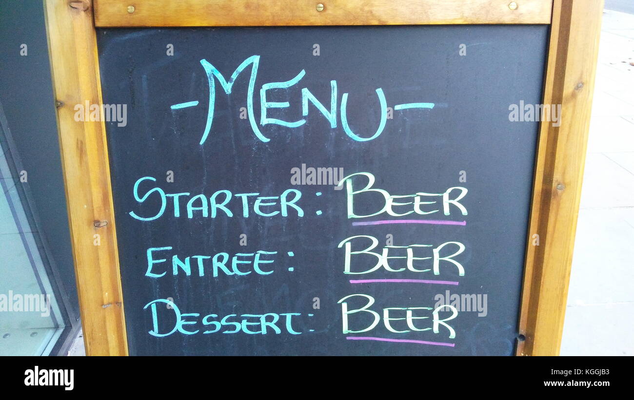 Funny beer menu on a chalkboard outside a pub in London Stock Photo - Alamy