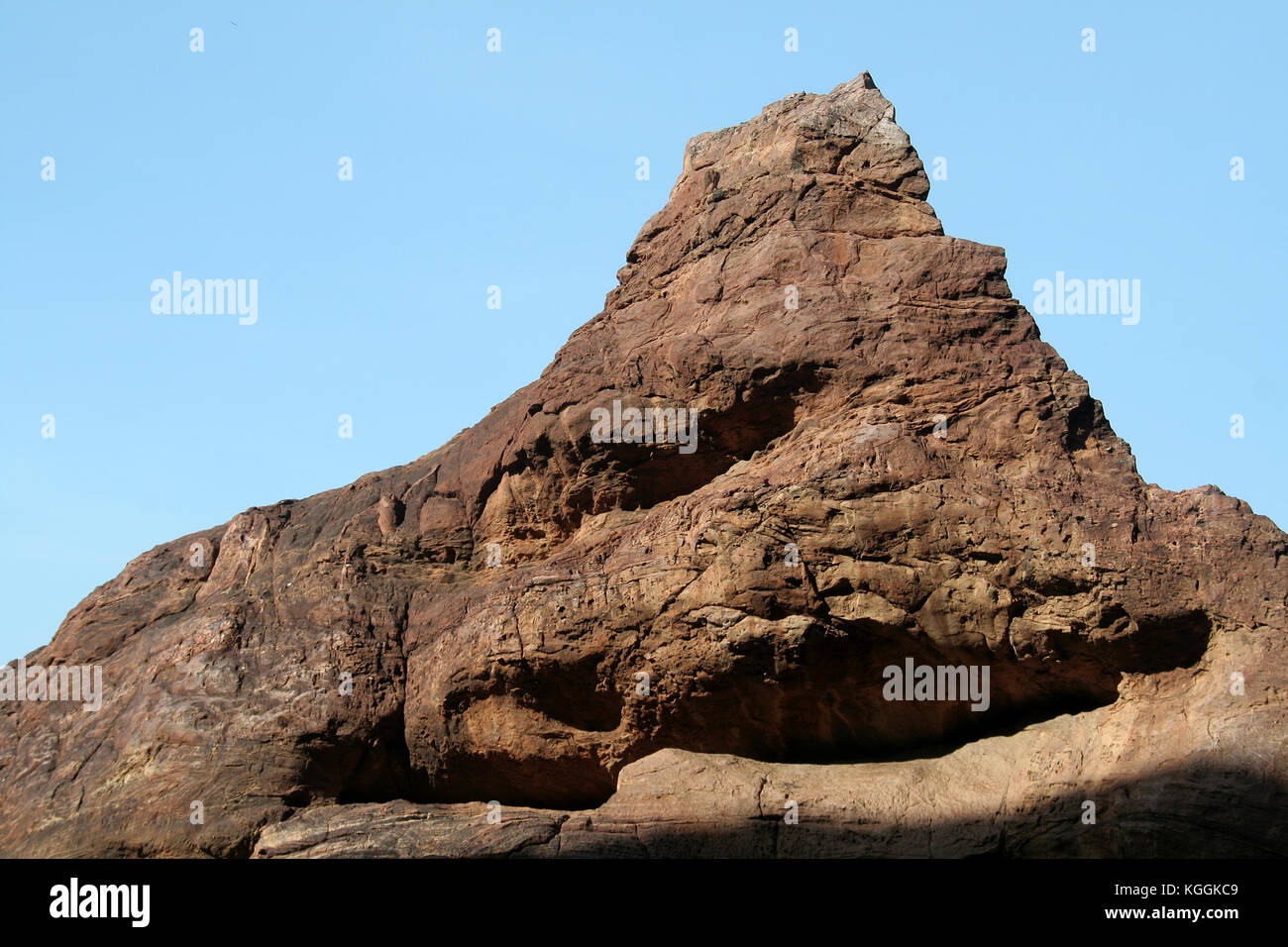 Sphinx-shaped rock on northern hill of Badami in Karnataka, India, Asia ...
