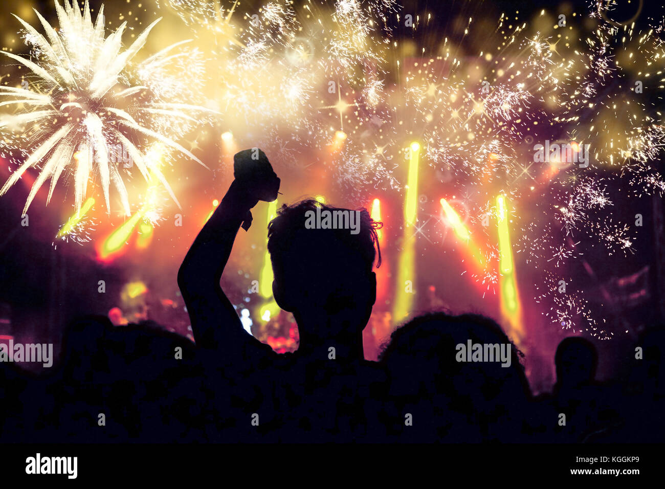 new Year concept - cheering crowd and fireworks Stock Photo - Alamy