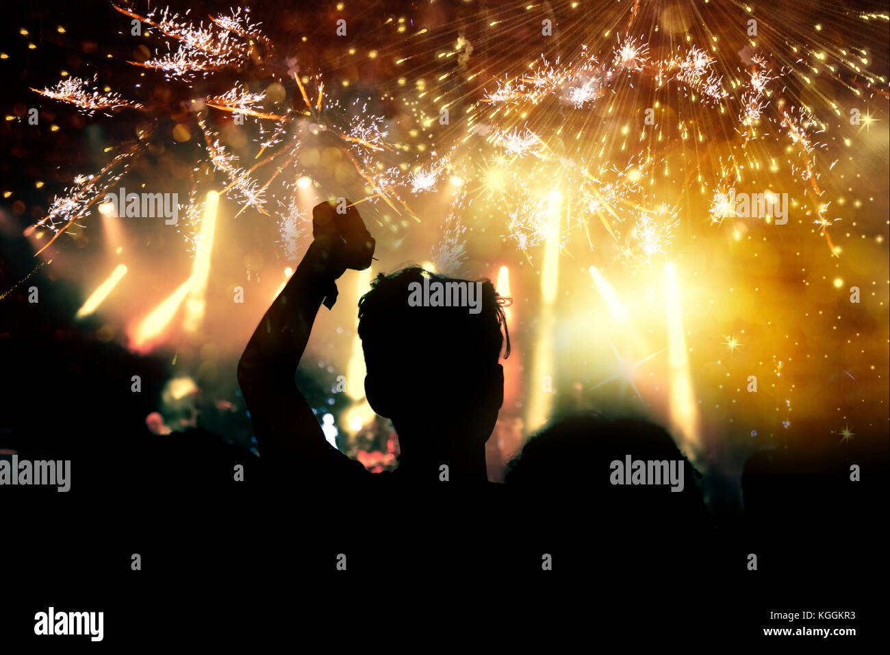 new Year concept - cheering crowd and fireworks Stock Photo - Alamy