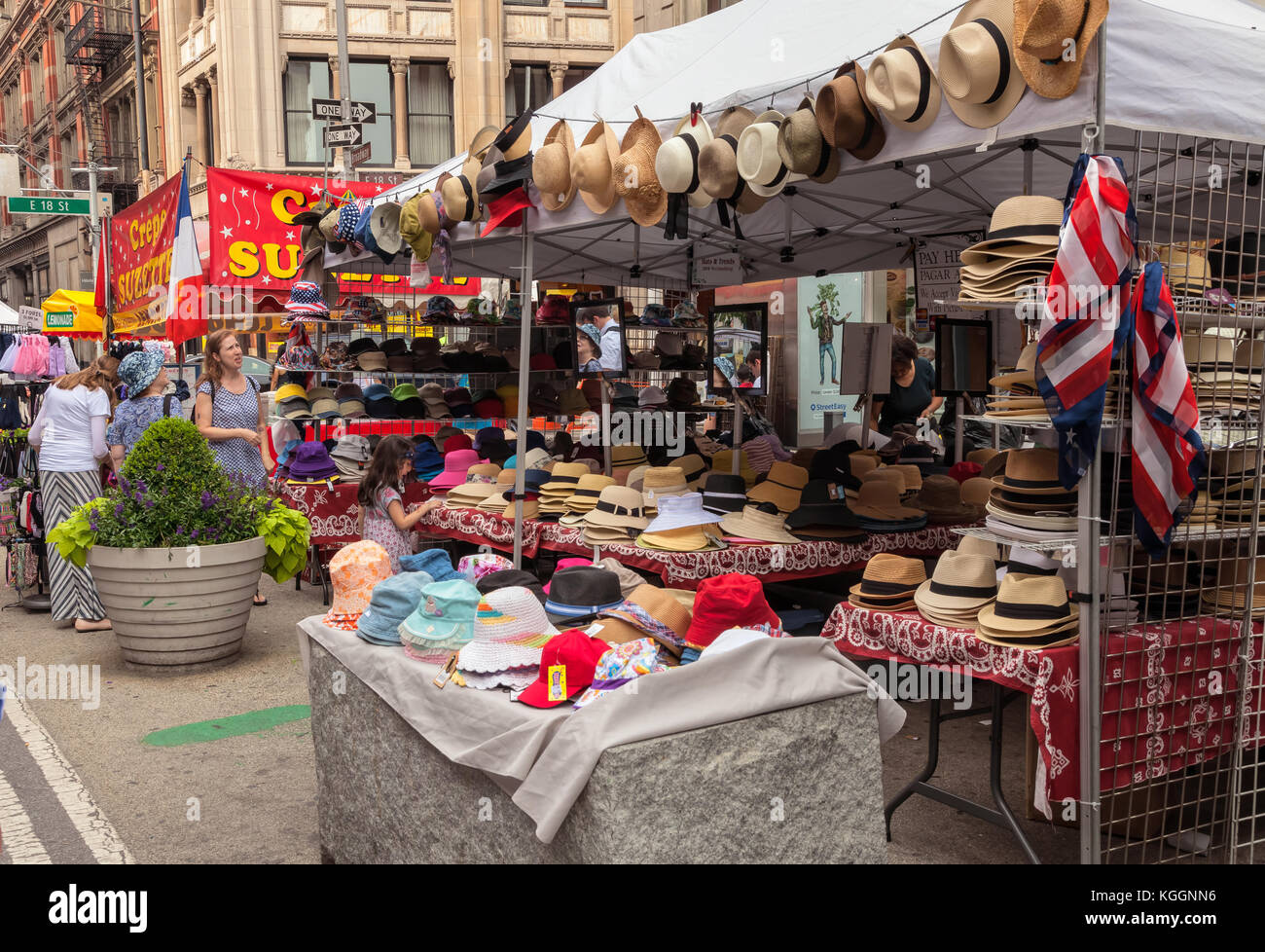 A pop up hat vendor in an open market on the street of New York City ...