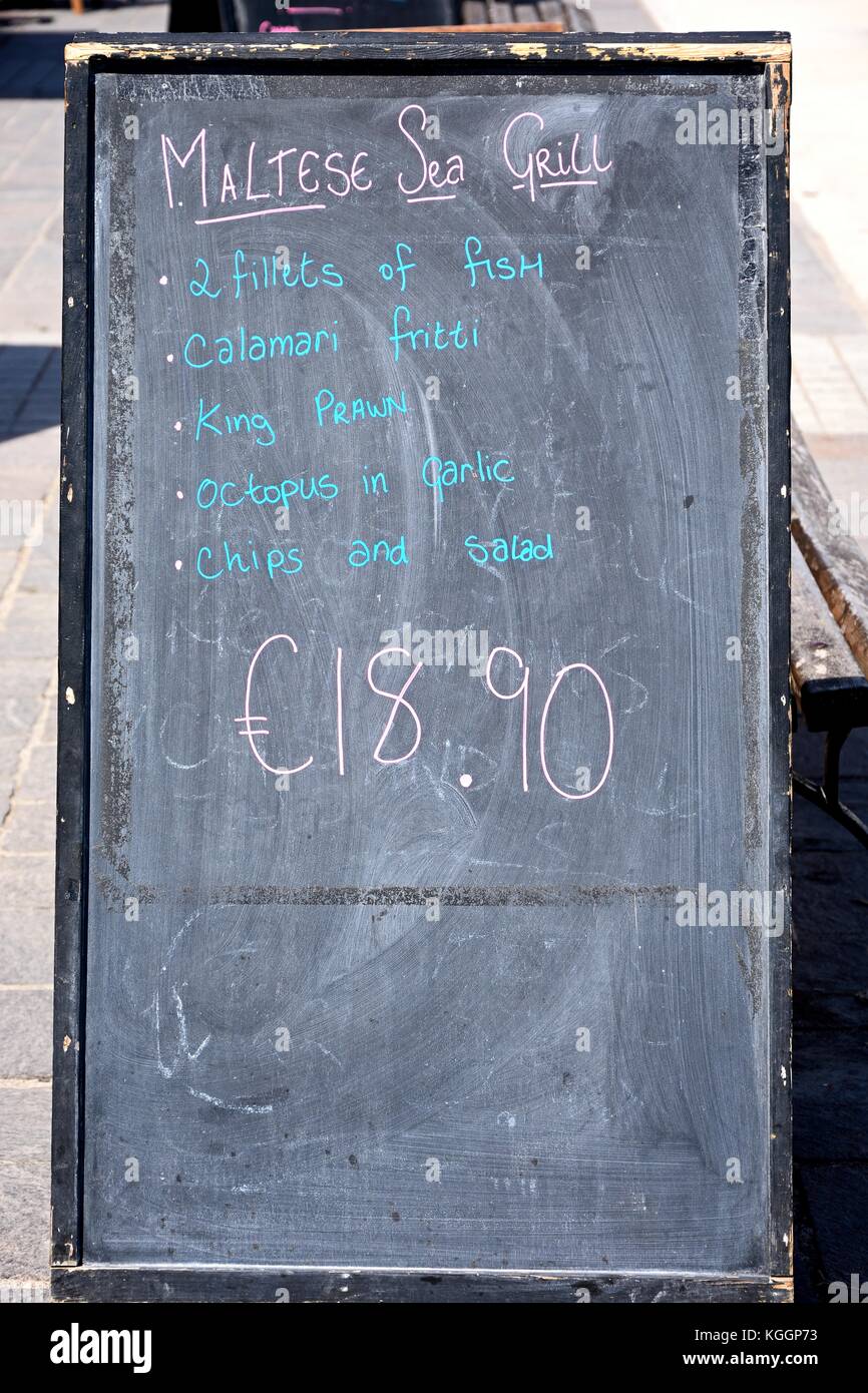 Maltese sea grill menu board along the waterfront, Marsaxlokk, Malta ...
