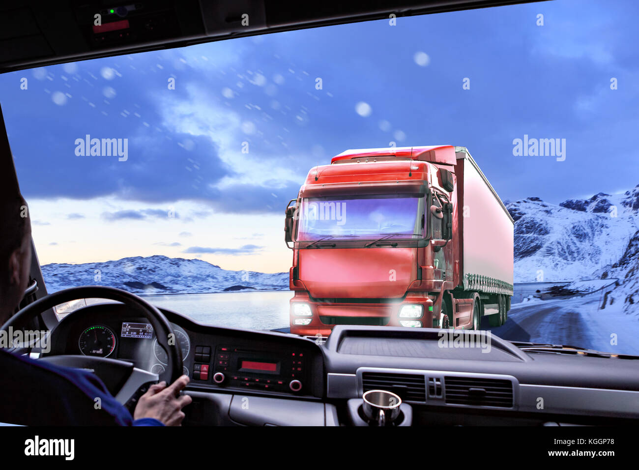 Driver view from the cockpit of a truck on the wintry road, symbolic ...