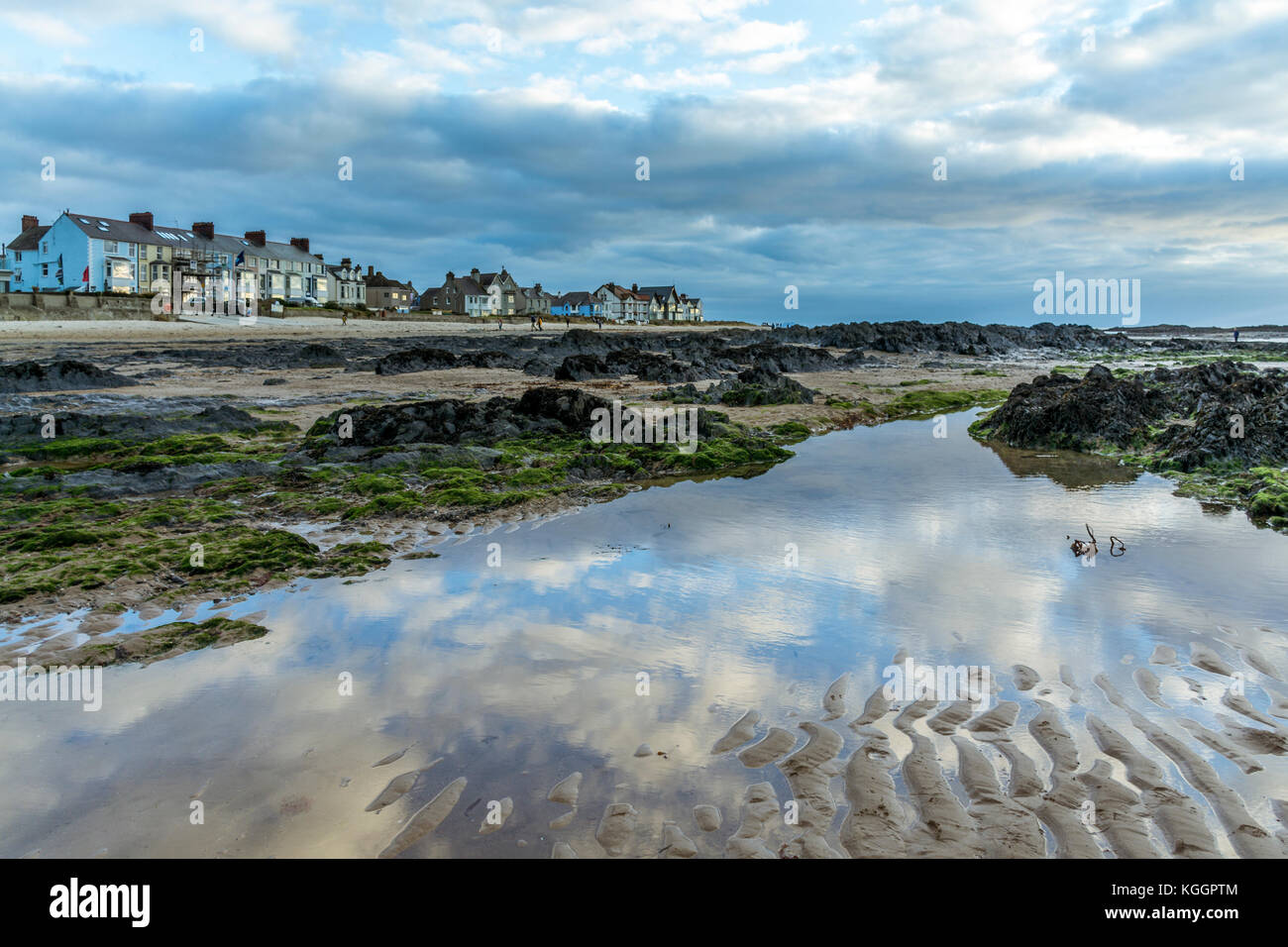 Late afternoon view of Rhosneigr town beach seafront on Anglesey, on a ...