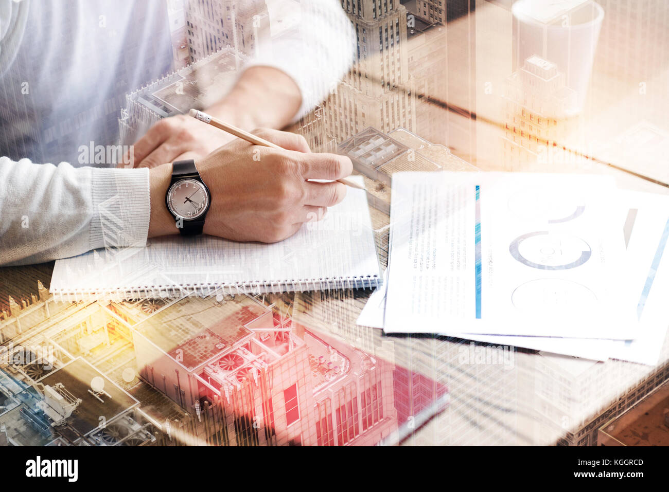 Businessman writing notes in documents hi-res stock photography and ...