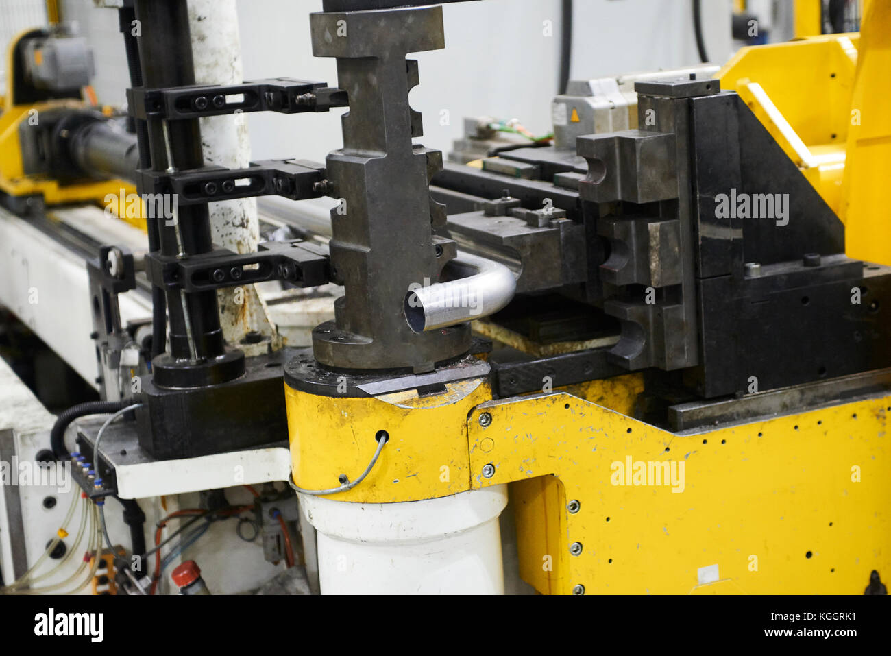 Robot bending pipe in modern factory Stock Photo - Alamy
