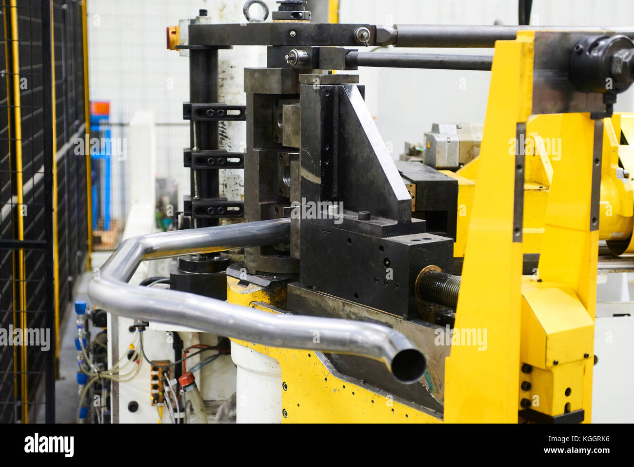 Robot bending pipe in modern factory Stock Photo - Alamy