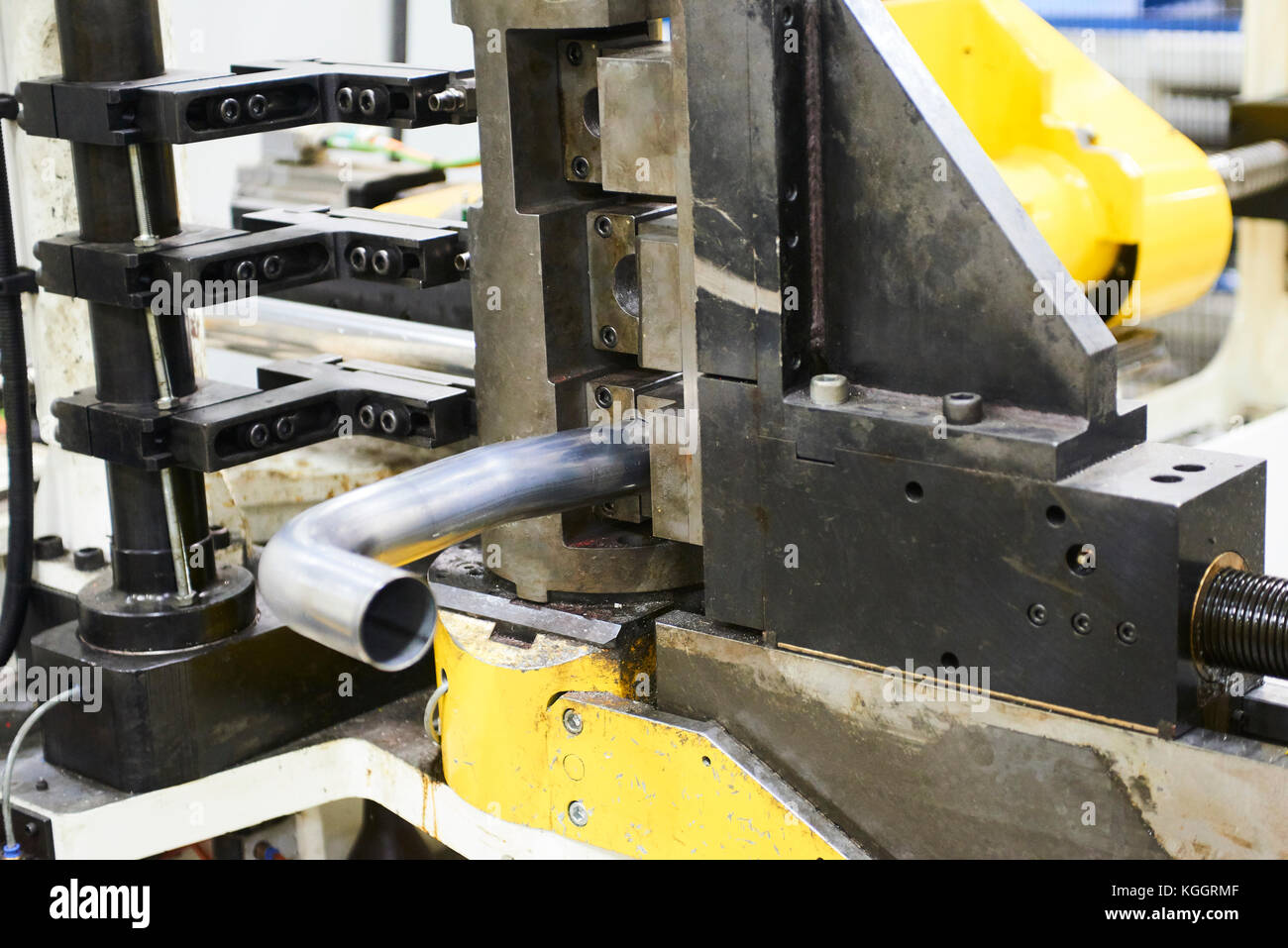 Robot bending pipe in modern factory Stock Photo - Alamy