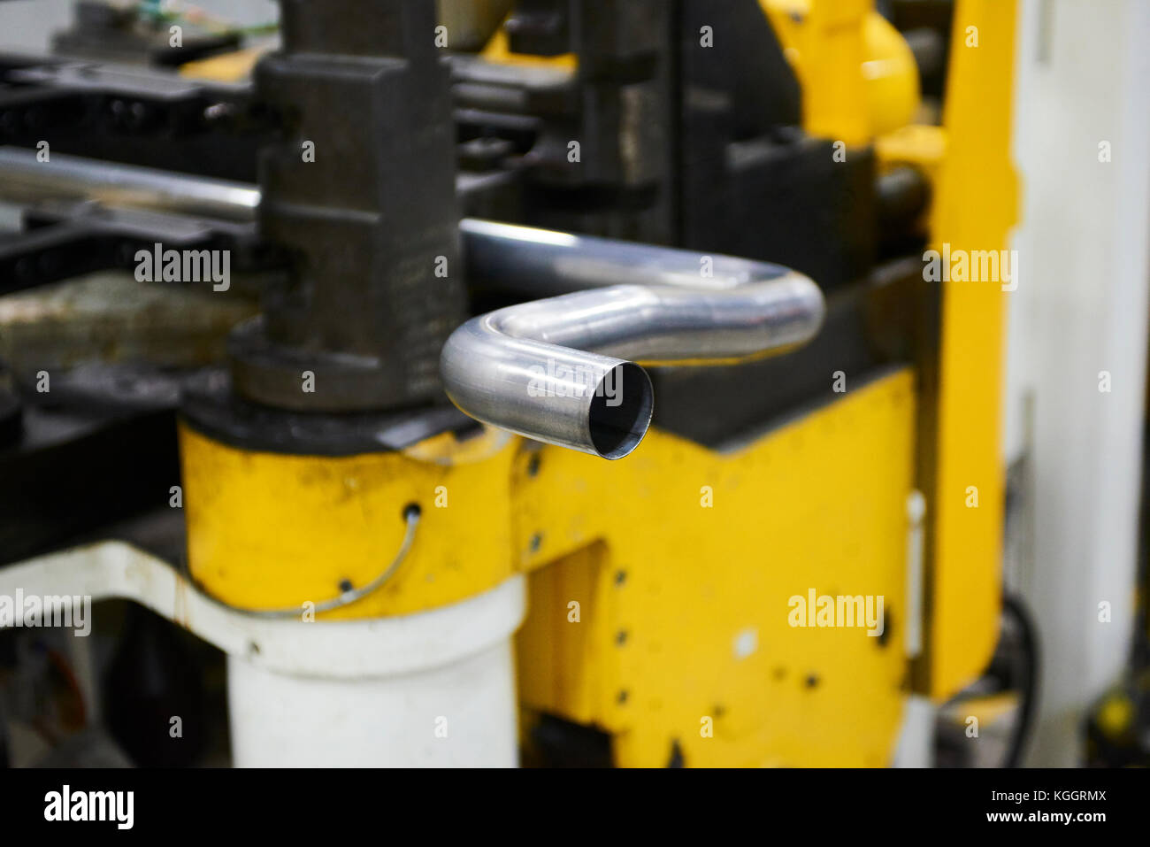 Robot bending pipe in modern factory Stock Photo - Alamy
