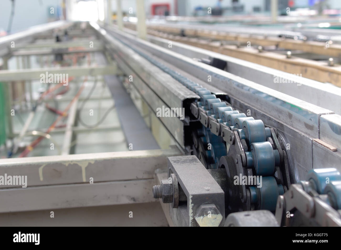 the chain drive shaft Line Conveyor Industrial Stock Photo - Alamy