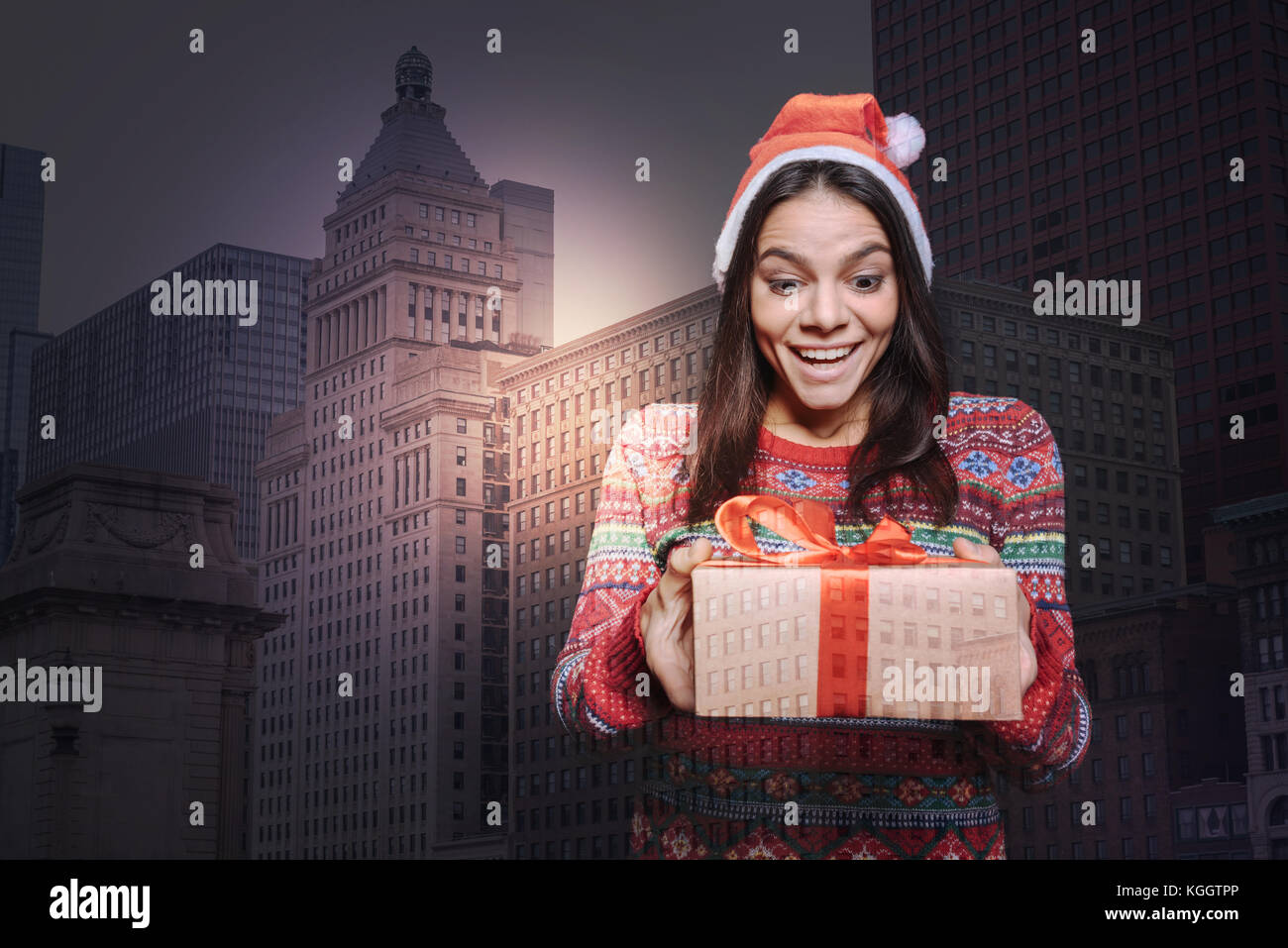 Emotional young person looking excited while getting a present Stock ...