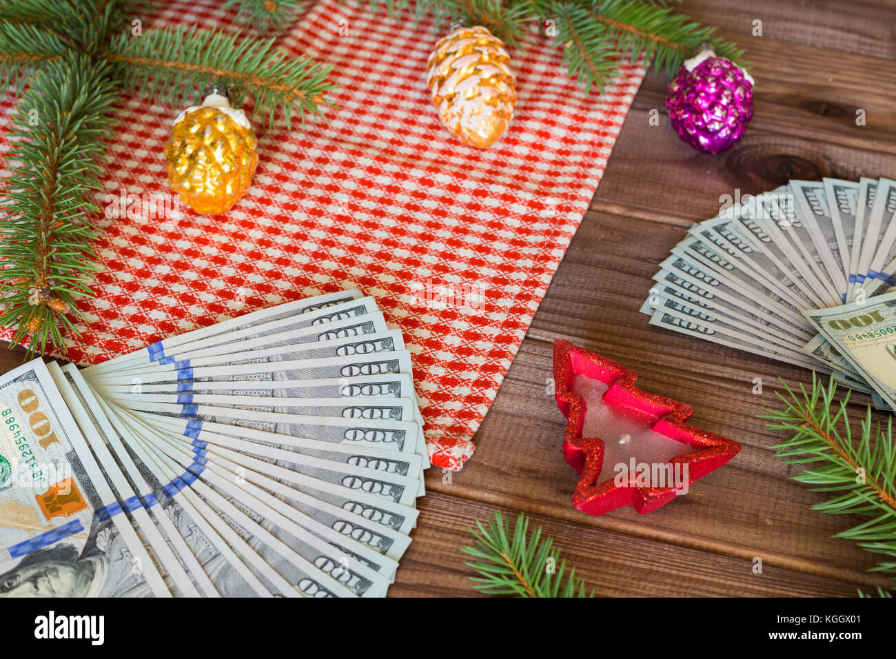 American dollars as a Christmas gif t or a Christmas spending concept ...