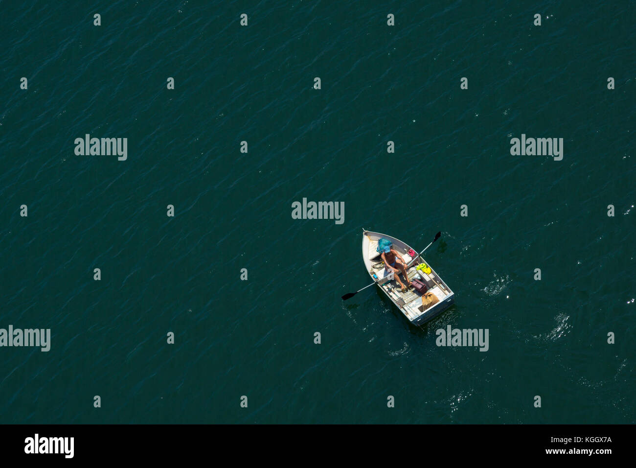 Man in the boat top view Stock Photo - Alamy