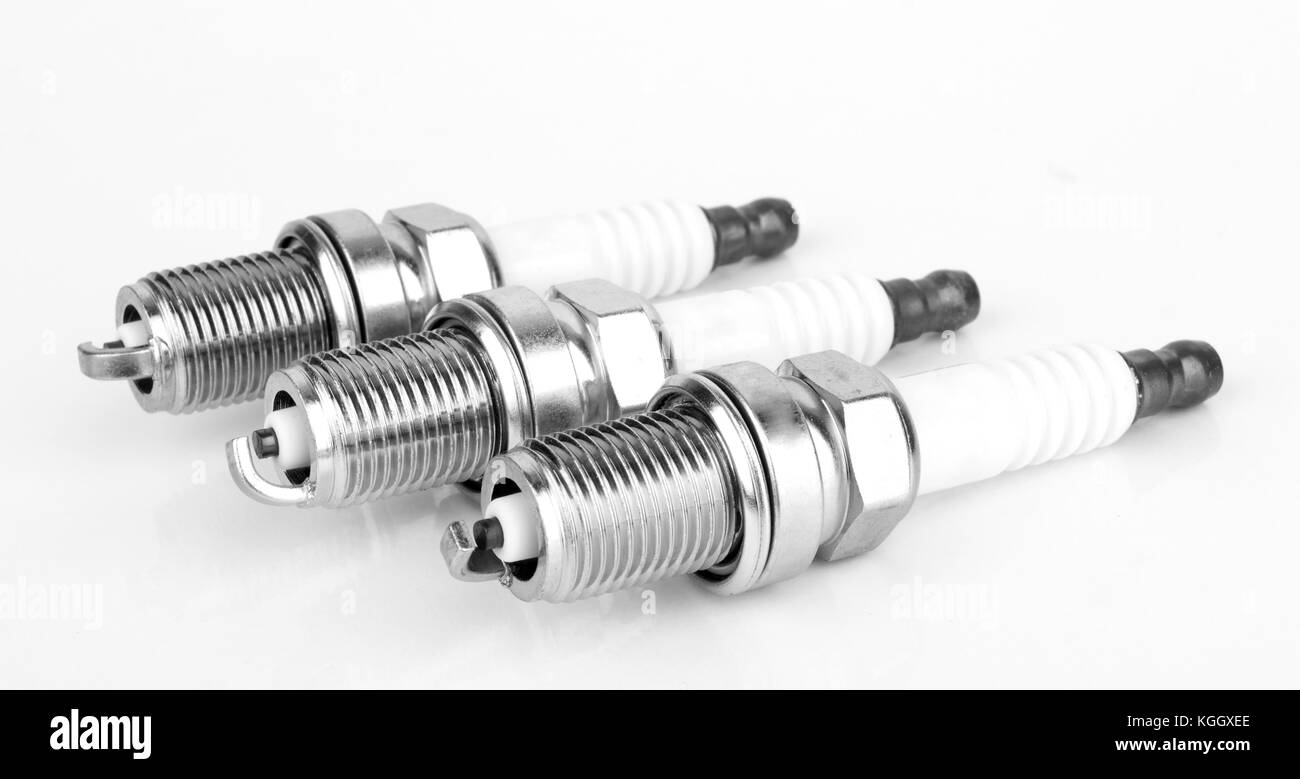 Set of spark plugs for the car on a white background Stock Photo - Alamy
