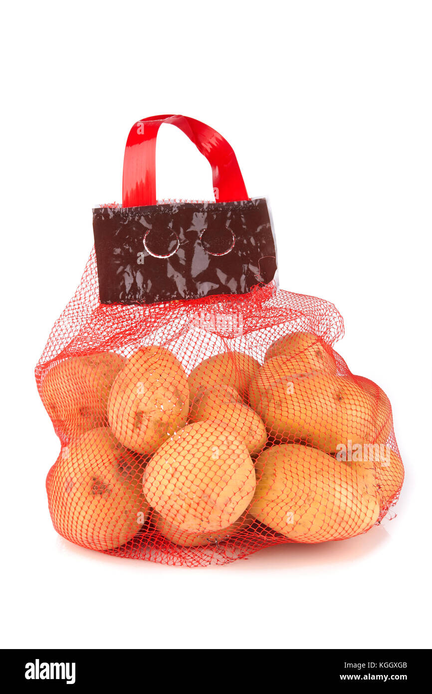 A red mesh bag with potato on a white Stock Photo - Alamy