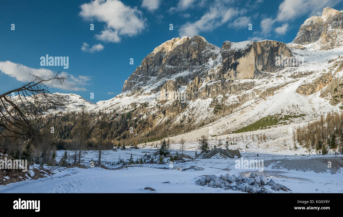 At the edge of seasons, autumn winter and spring mountain valley, Val ...
