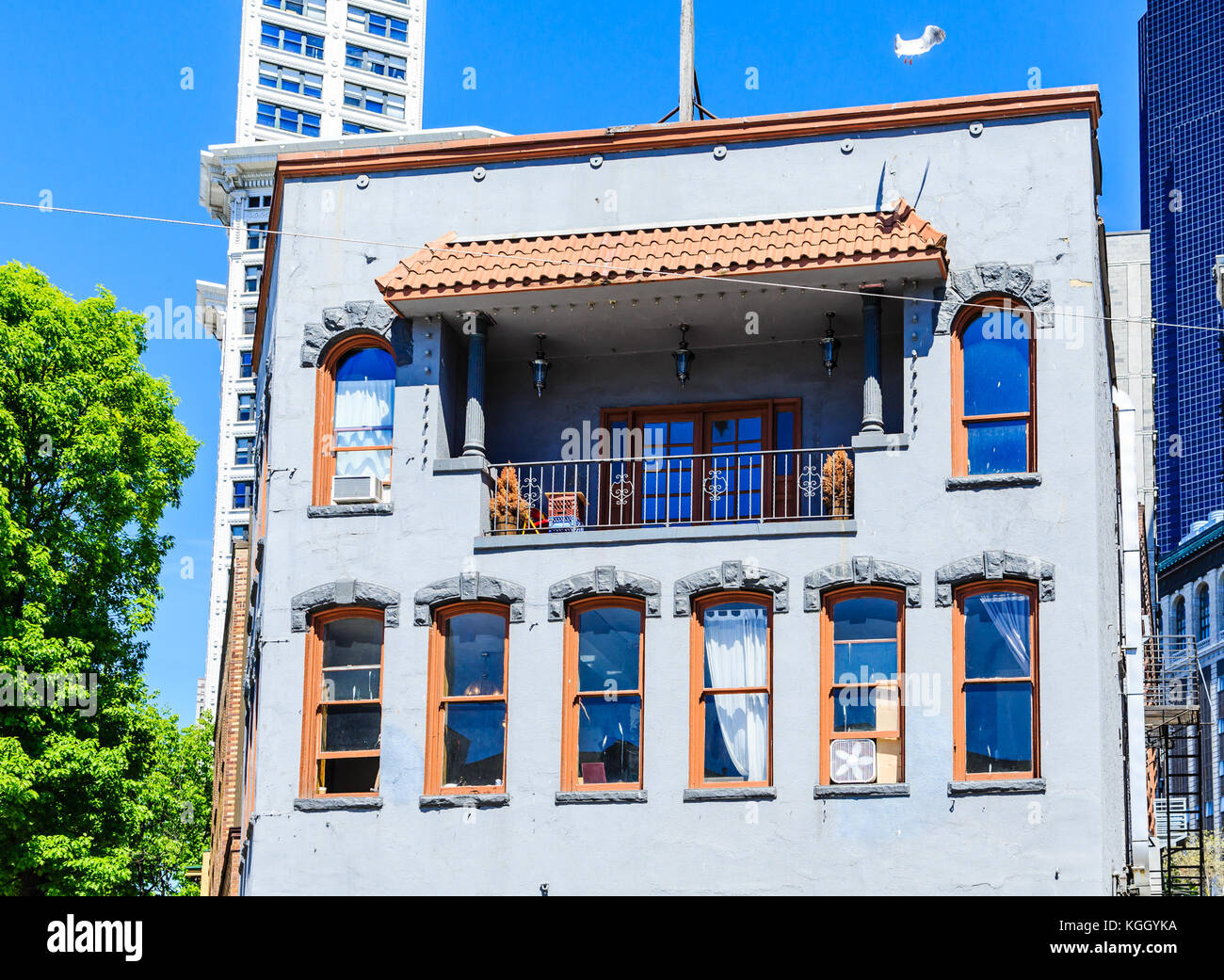 Old Blue Plaster Building in Downtown Seattle among Skyscrapers Stock ...
