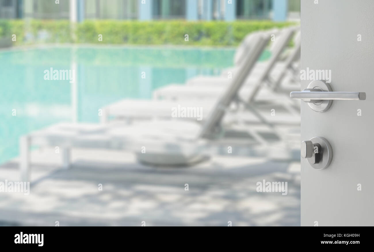 opened white door to swimming pool with beach chairs Stock Photo - Alamy