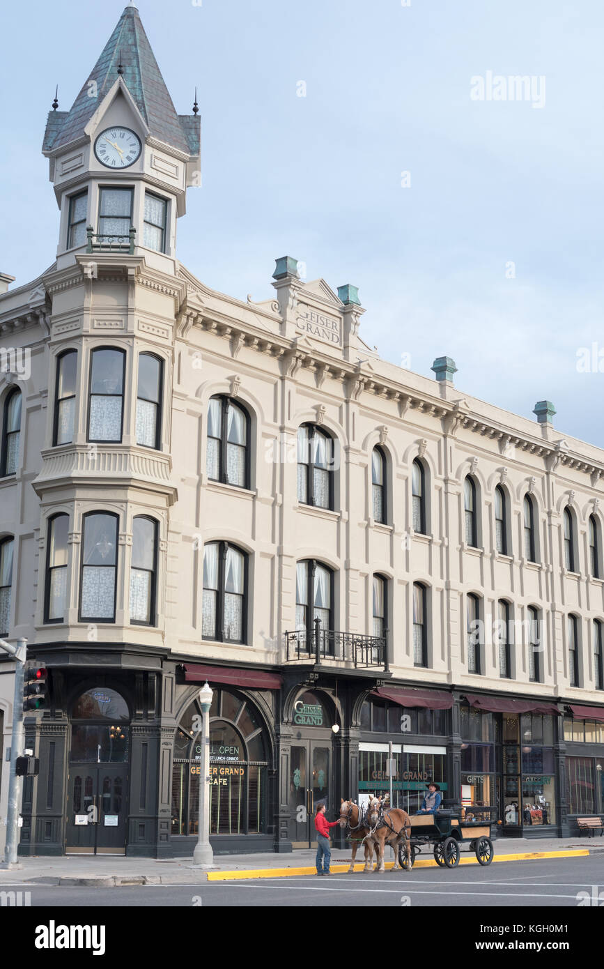 Couple with horse drawn buggy in front of the historic Geiser Grand ...
