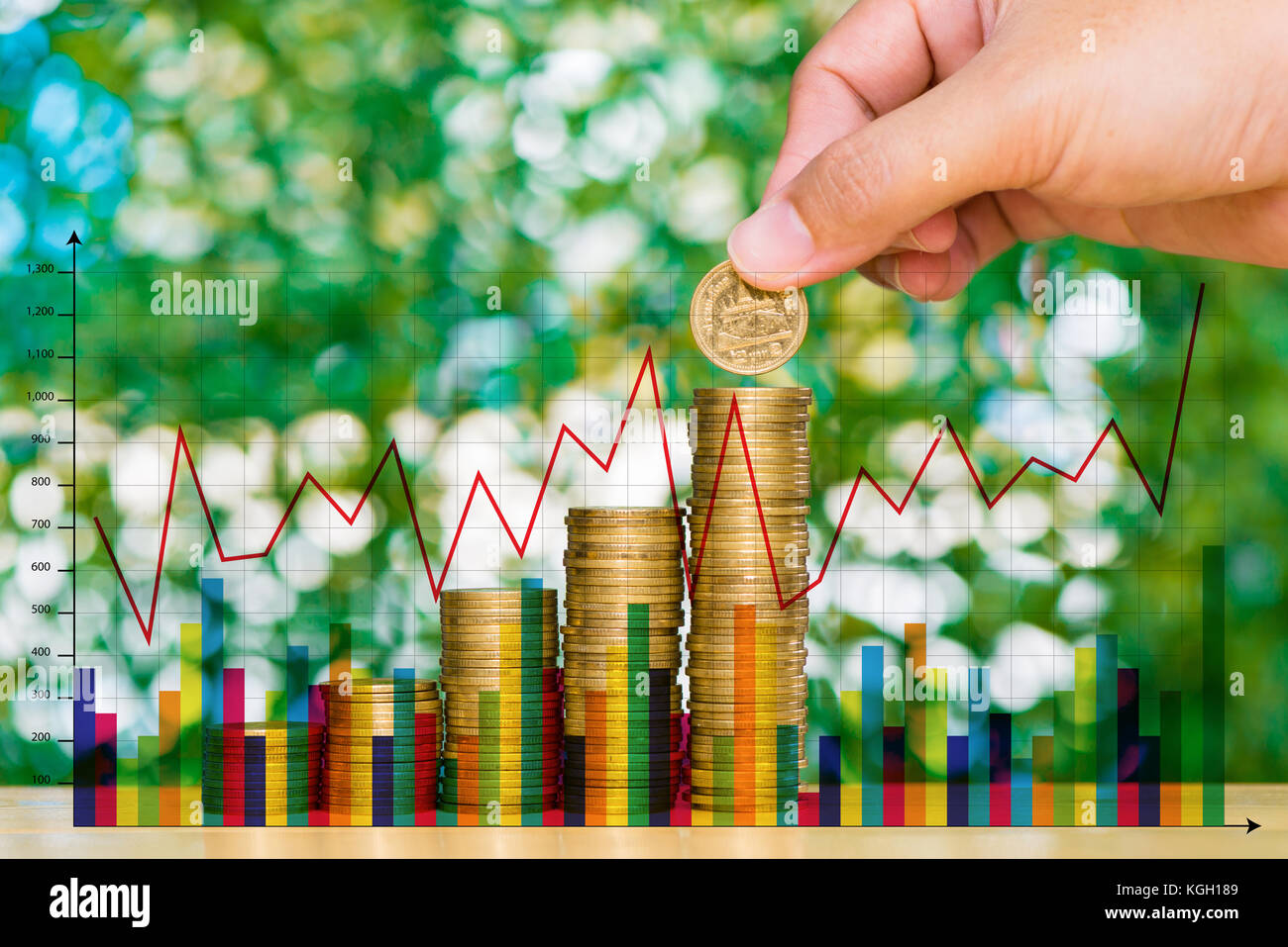 Woman hand put coin on step of coins stacks and gold coin money in the ...