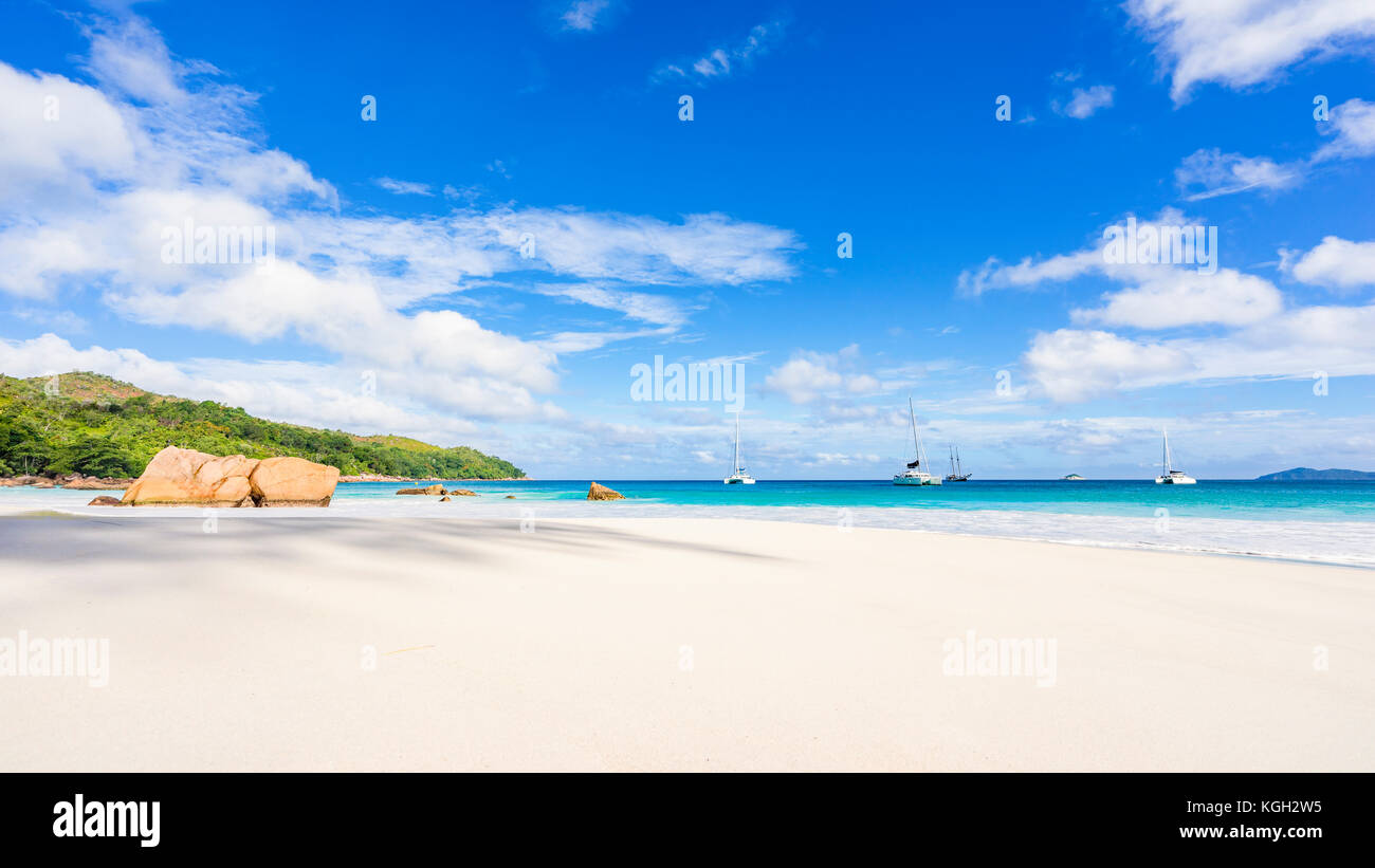 Catamarans at anse lazio on the seychelles. Turquoise water, granite ...