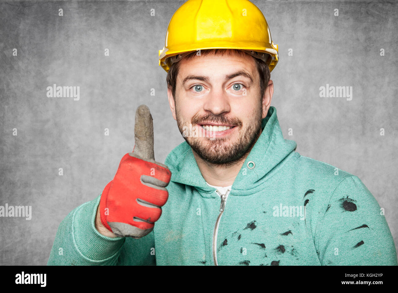 portrait of a positive worker, thumb up Stock Photo - Alamy
