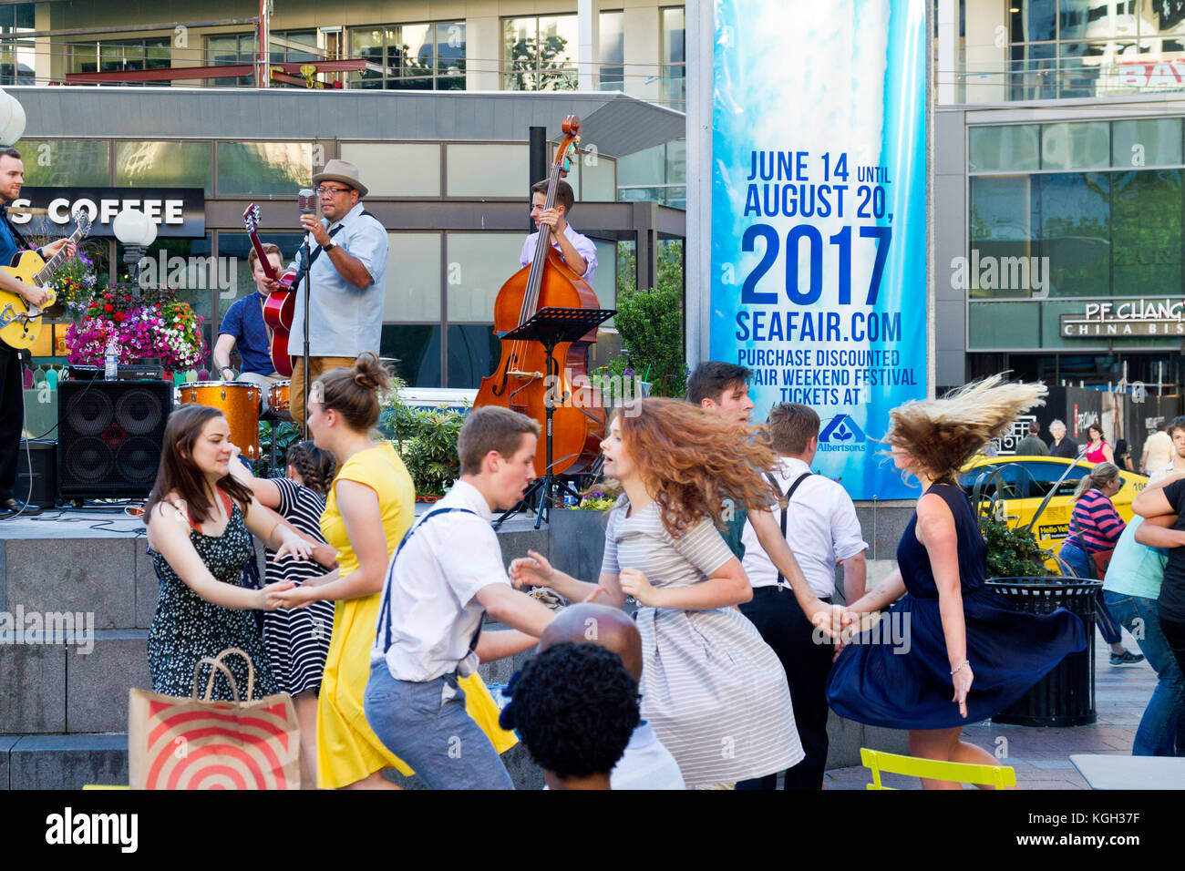 Young people jitterbugging at an outdoor dance exhibition in Seattle ...