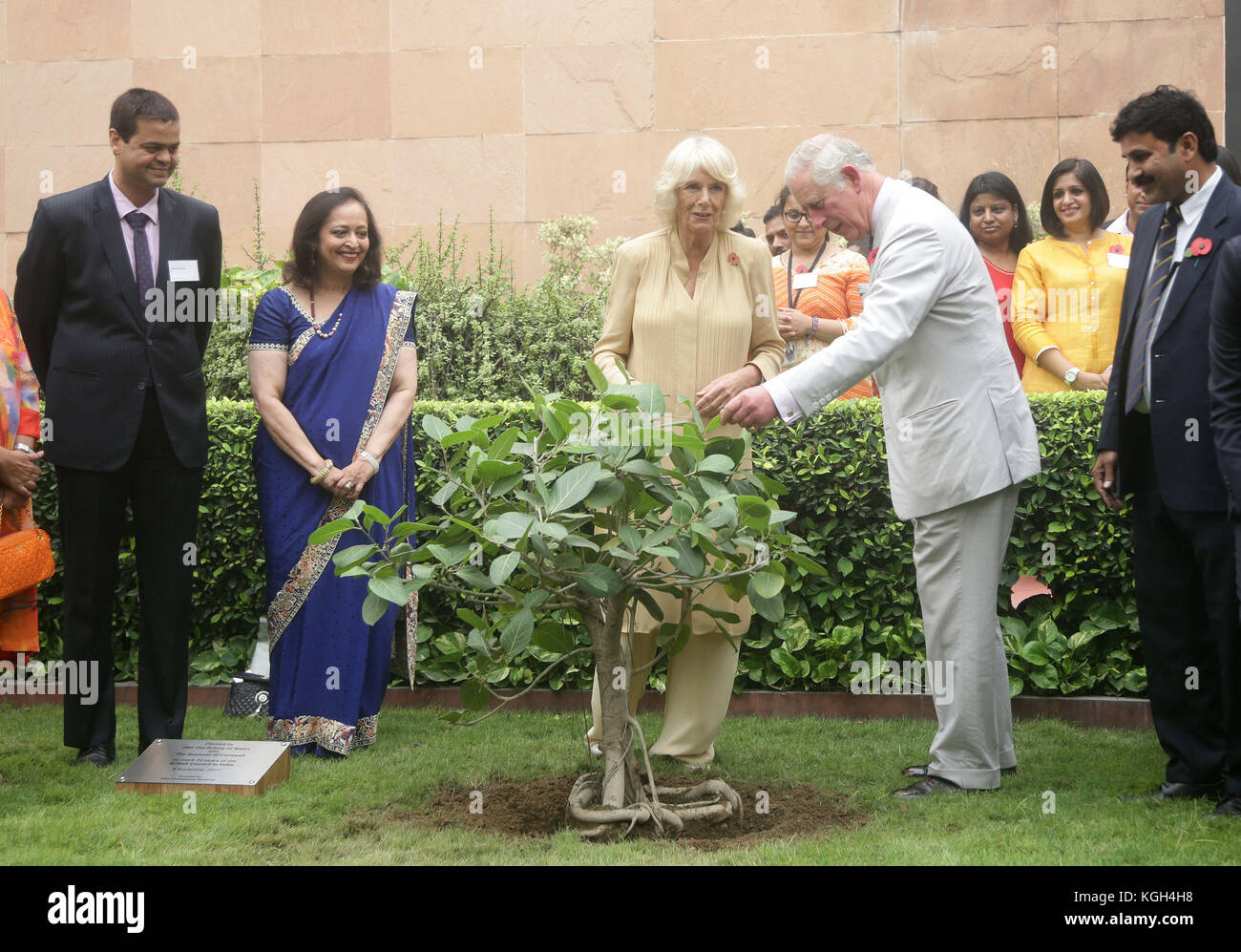 The Prince of Wales and the Duchess of Cornwall plant a Banyan tree at ...