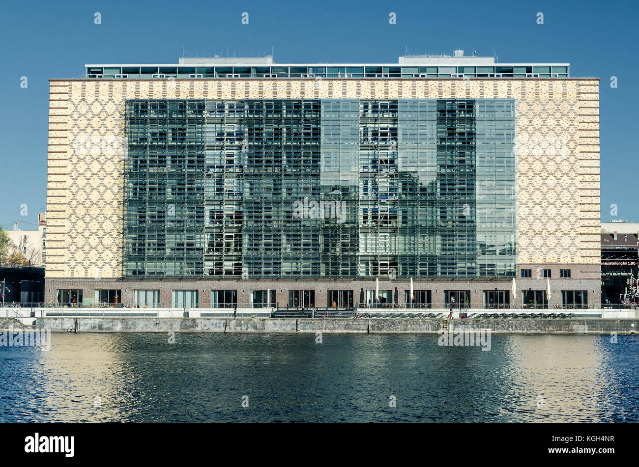 front of a modern office building in berlin on the river spree ...
