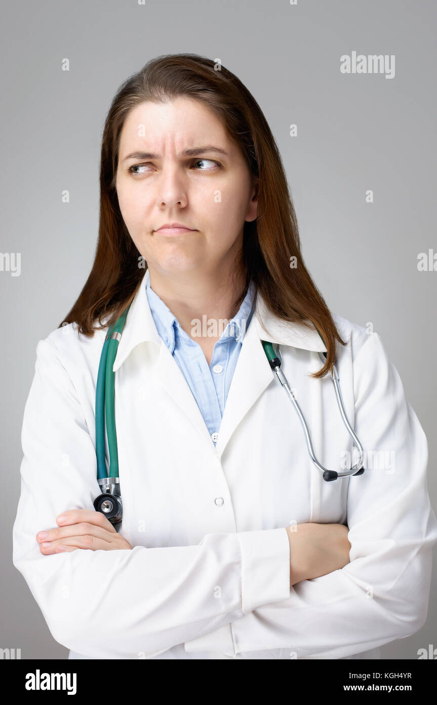 Portrait of an angry, annoyed female doctor Stock Photo - Alamy