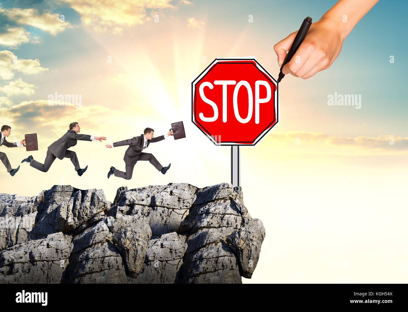 Hand draw stop. Team man running on way Stock Photo - Alamy
