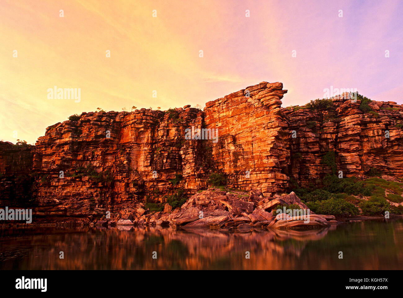 Sandstone escarpment meets the Kimberley coast, mangroves border the ...