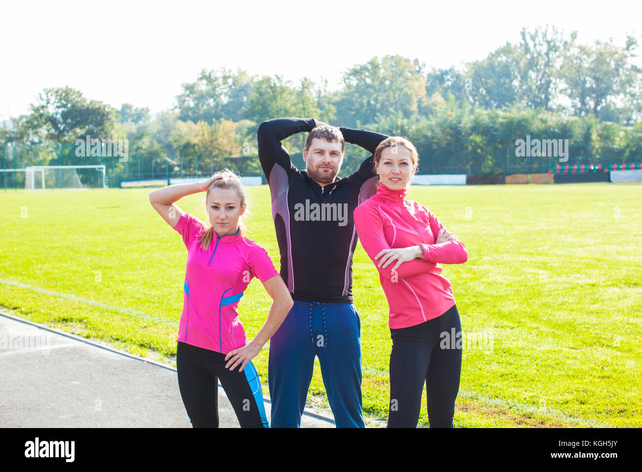 Friends before workout Stock Photo - Alamy