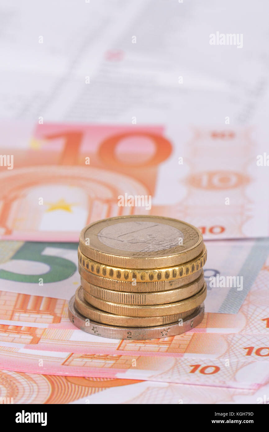 Stack of euro banknotes and coins, currency money in finance concept ...