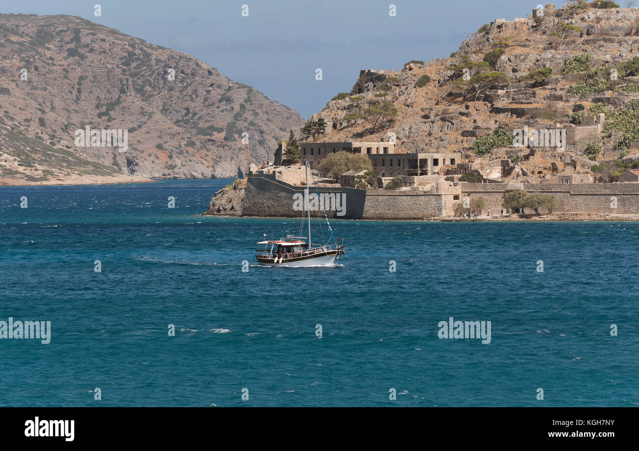 Passenger ferry off Spinalonga Island a former Leper Colony in northern ...